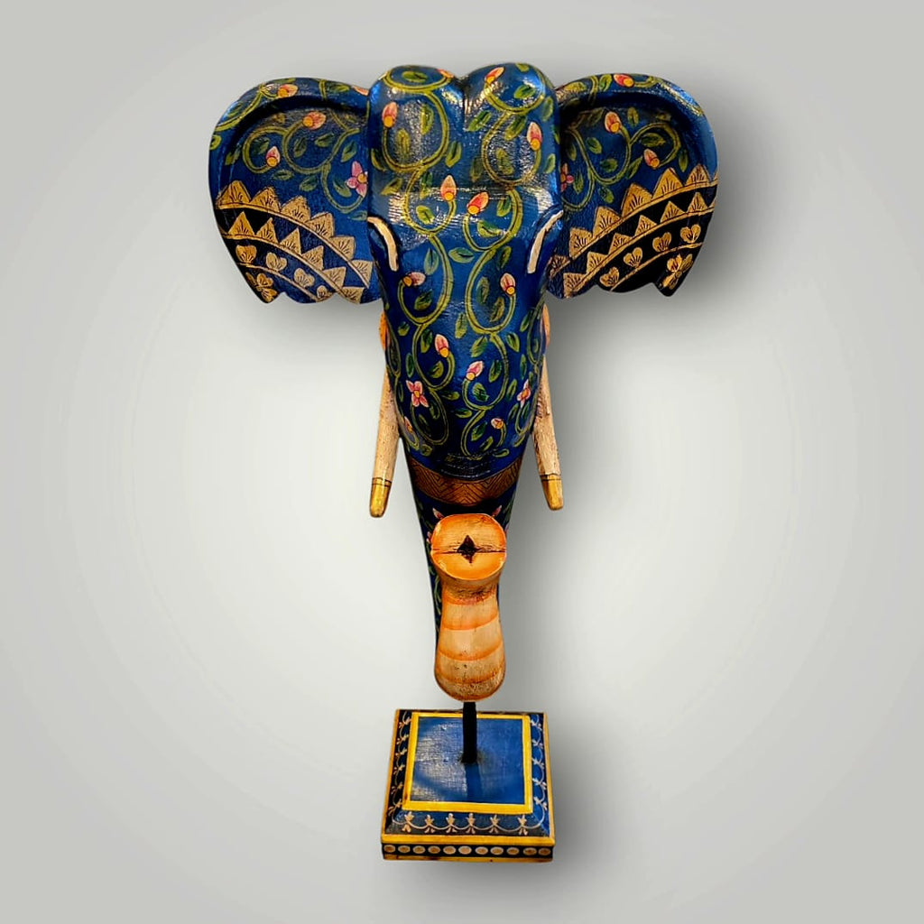Wooden blue elephant trunk on stand – Studio Red Lifestyle